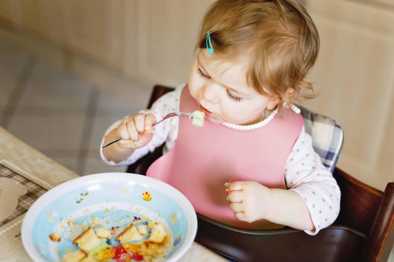 4 Steps to Get Your Wiggly Child to Sit Still at Meals